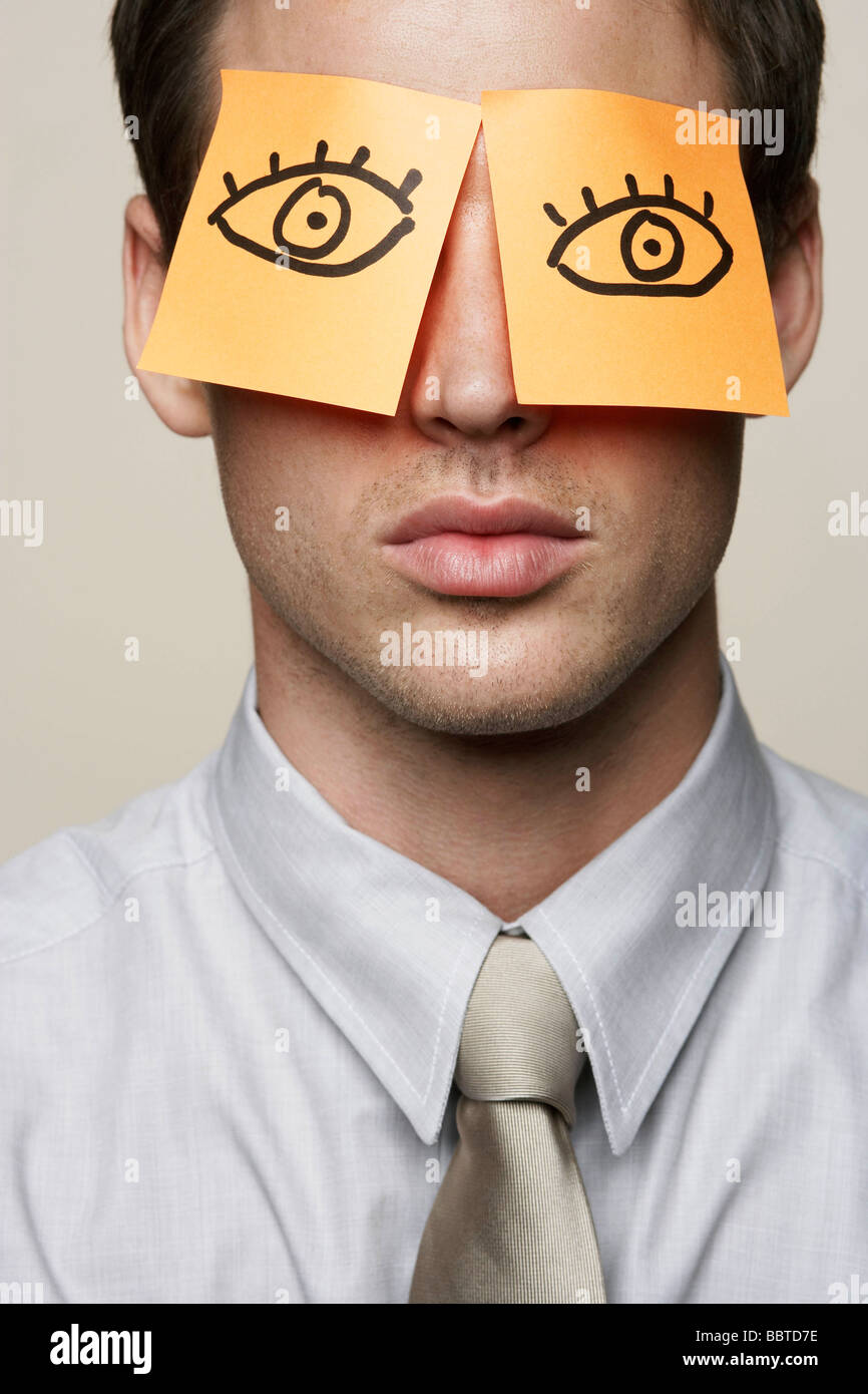 Business man with post-it notes on eyes Stock Photo - Alamy