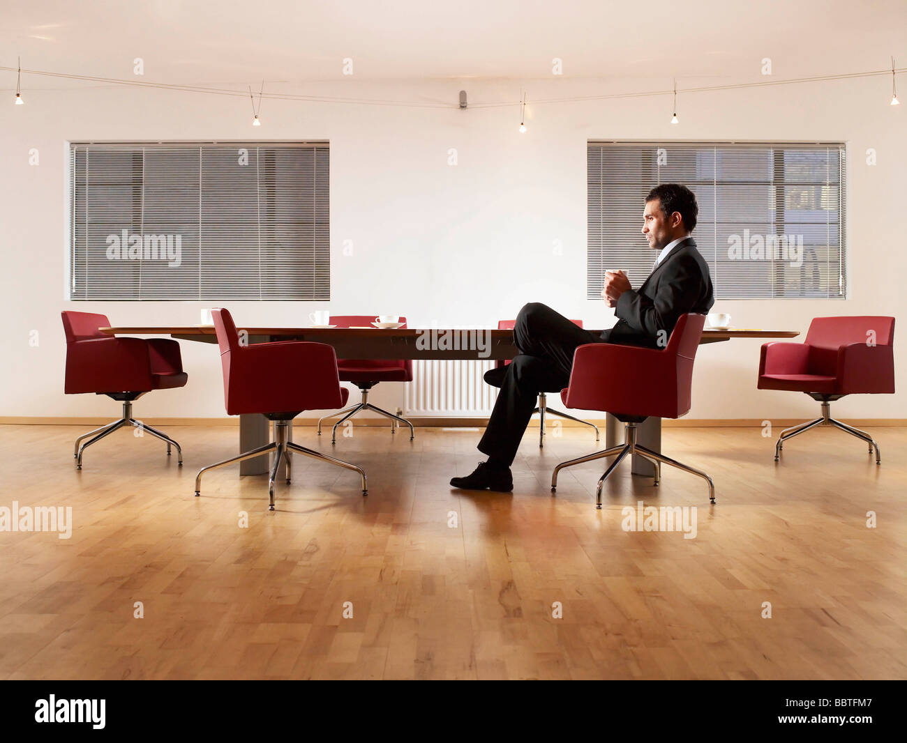 Man seated table in hi-res stock photography and images - Alamy