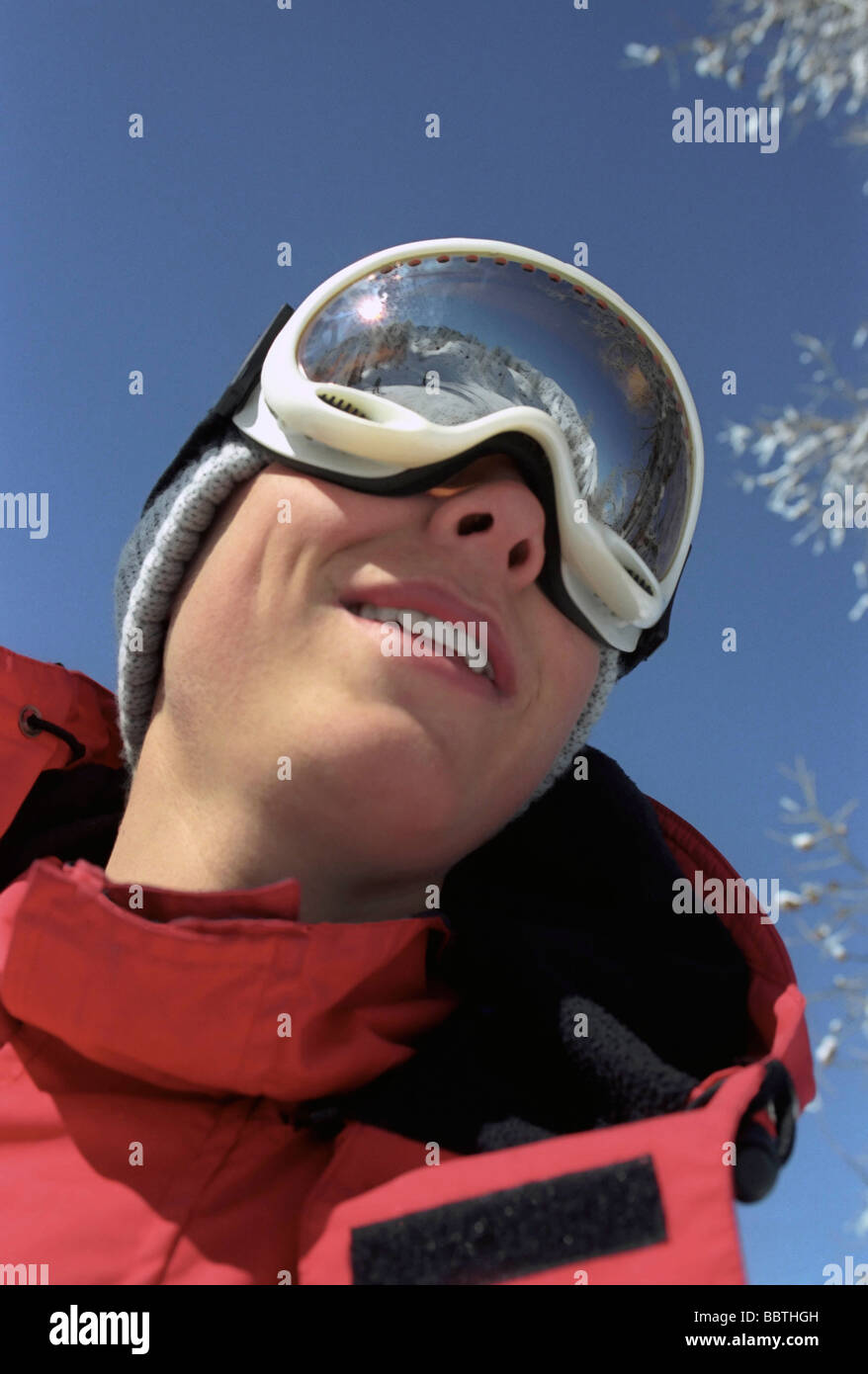 Male smiling, wearing goggles Stock Photo - Alamy