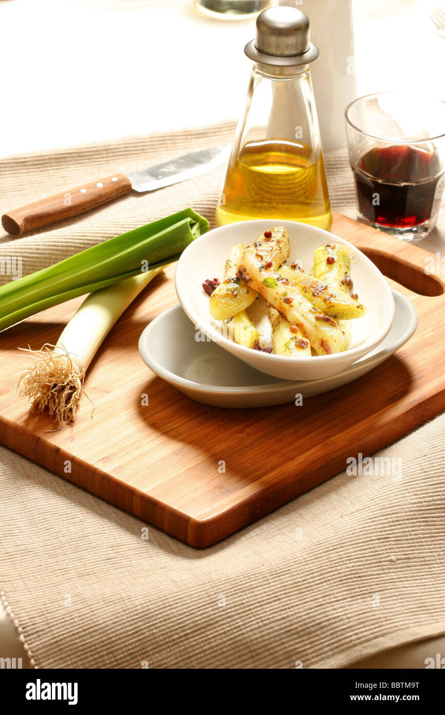 Grilled leeks with mustard, Italy Stock Photo - Alamy