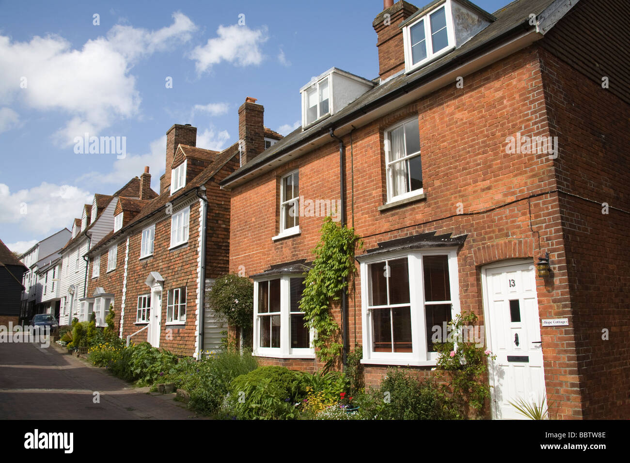 Tenterden Kent England UK May A row of terraced houses of red brick and ...