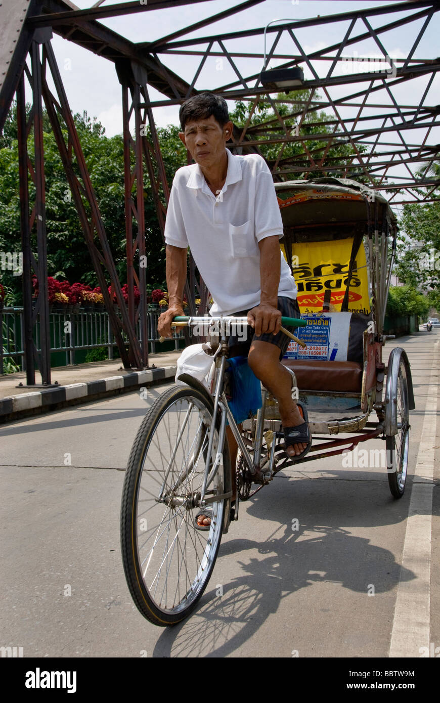Tricycle taxi rider in Chiang Mai Thailand Stock Photo - Alamy