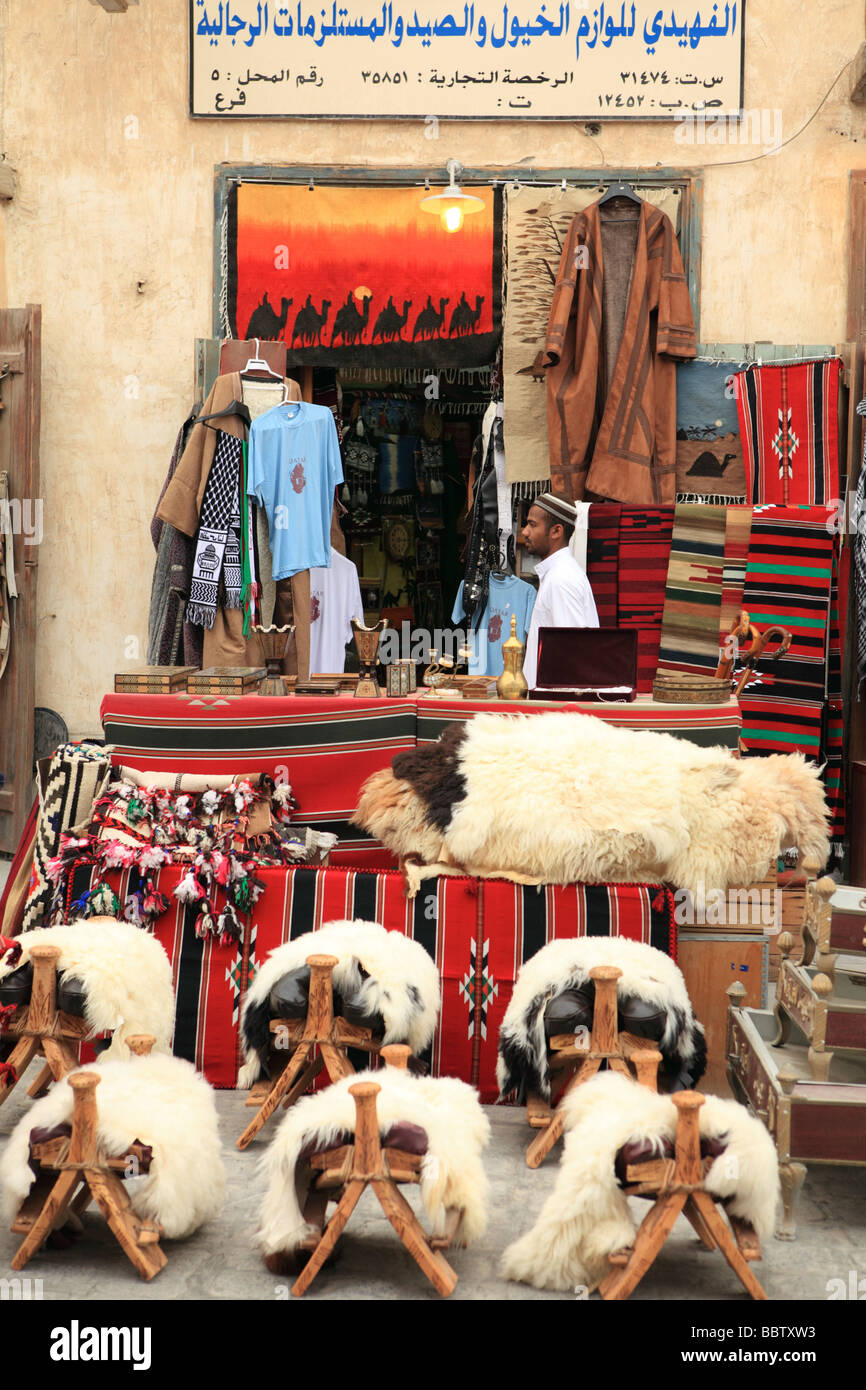 A shop in Souq Waqif in Doha Qatar selling stools fashioned as camel ...