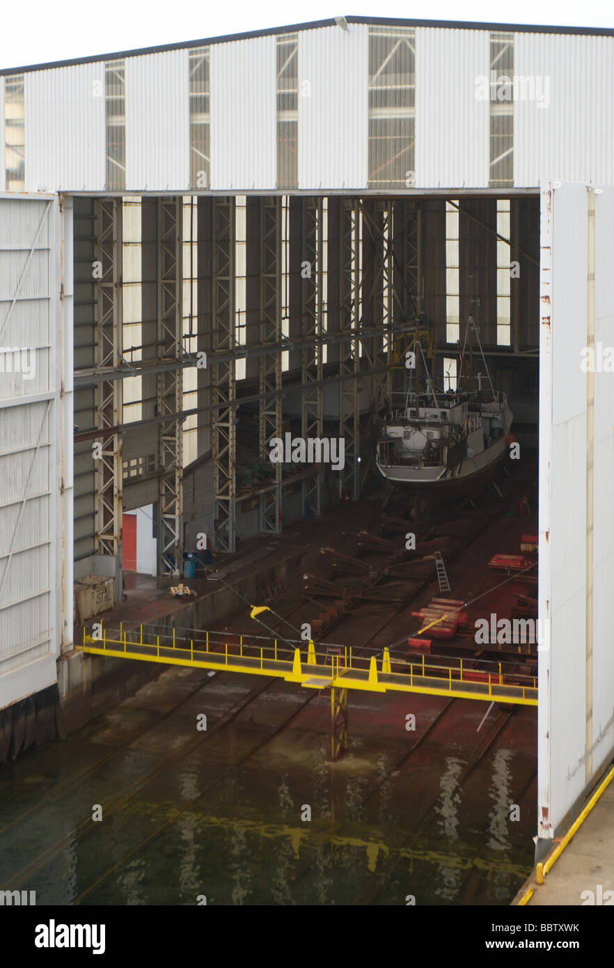small boat in dry dock Stock Photo - Alamy