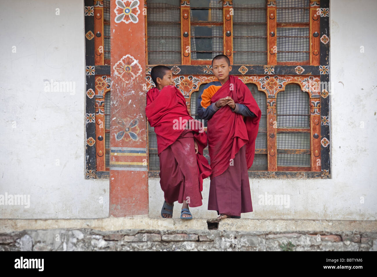 Young monks in red habit Thimphu monastery, Bhutan Stock Photo - Alamy