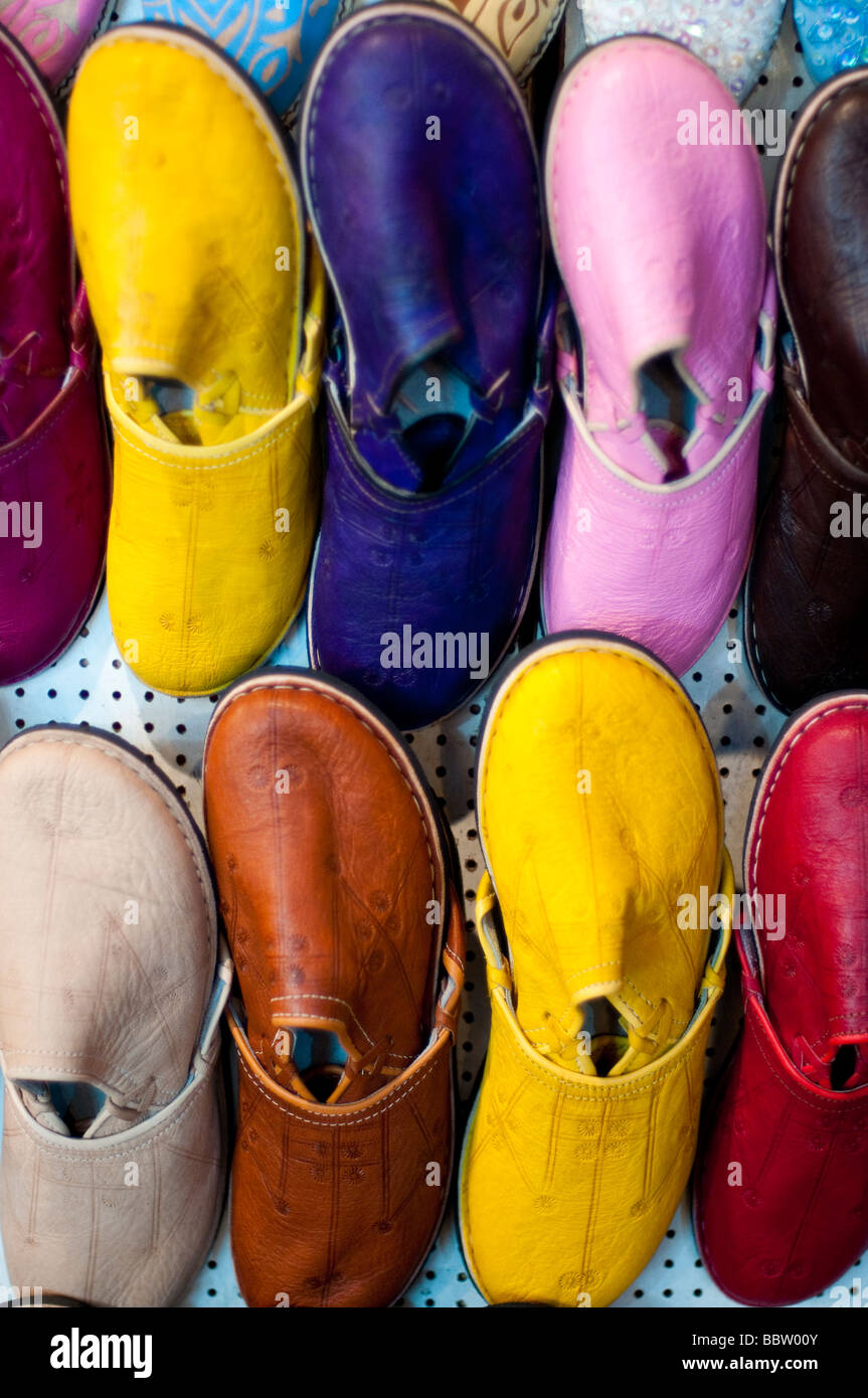 Colourful stacked shoes in a stall in Djemaa el Fna square in Marrakesh ...