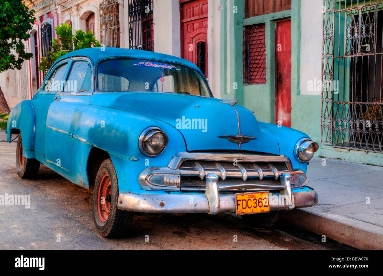 Blue car in Cienfuegos, Cuba, Caribbean Stock Photo - Alamy