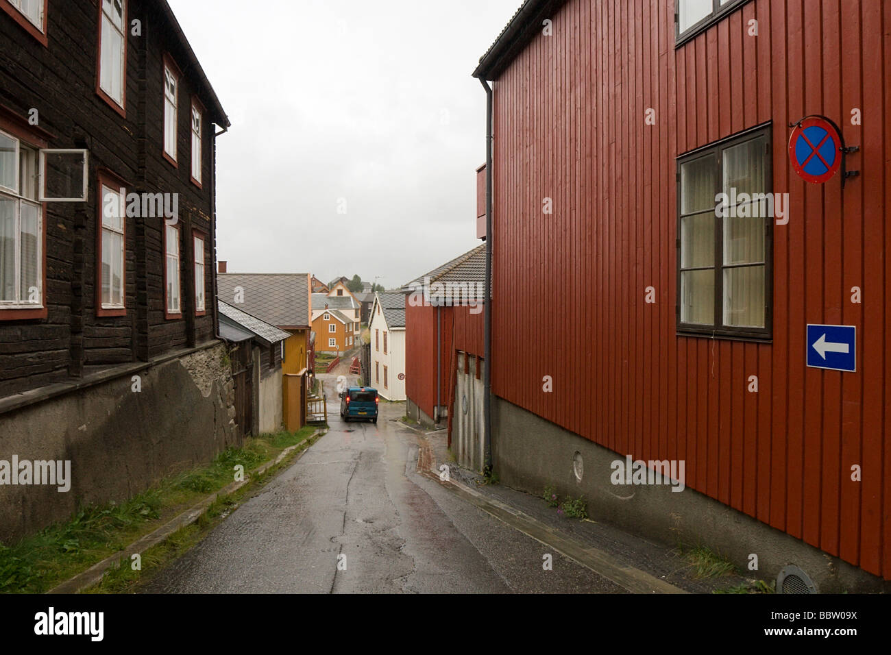 Road between houses in country small town Stock Photo - Alamy
