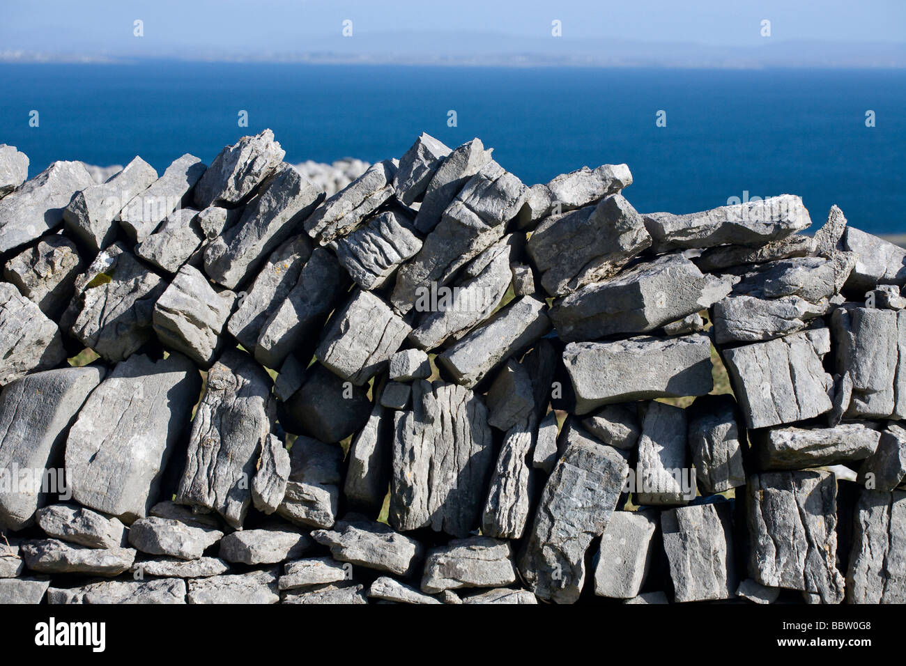 Dry Stone Wall. Detail of an Inishmore drystone wall with the electric ...