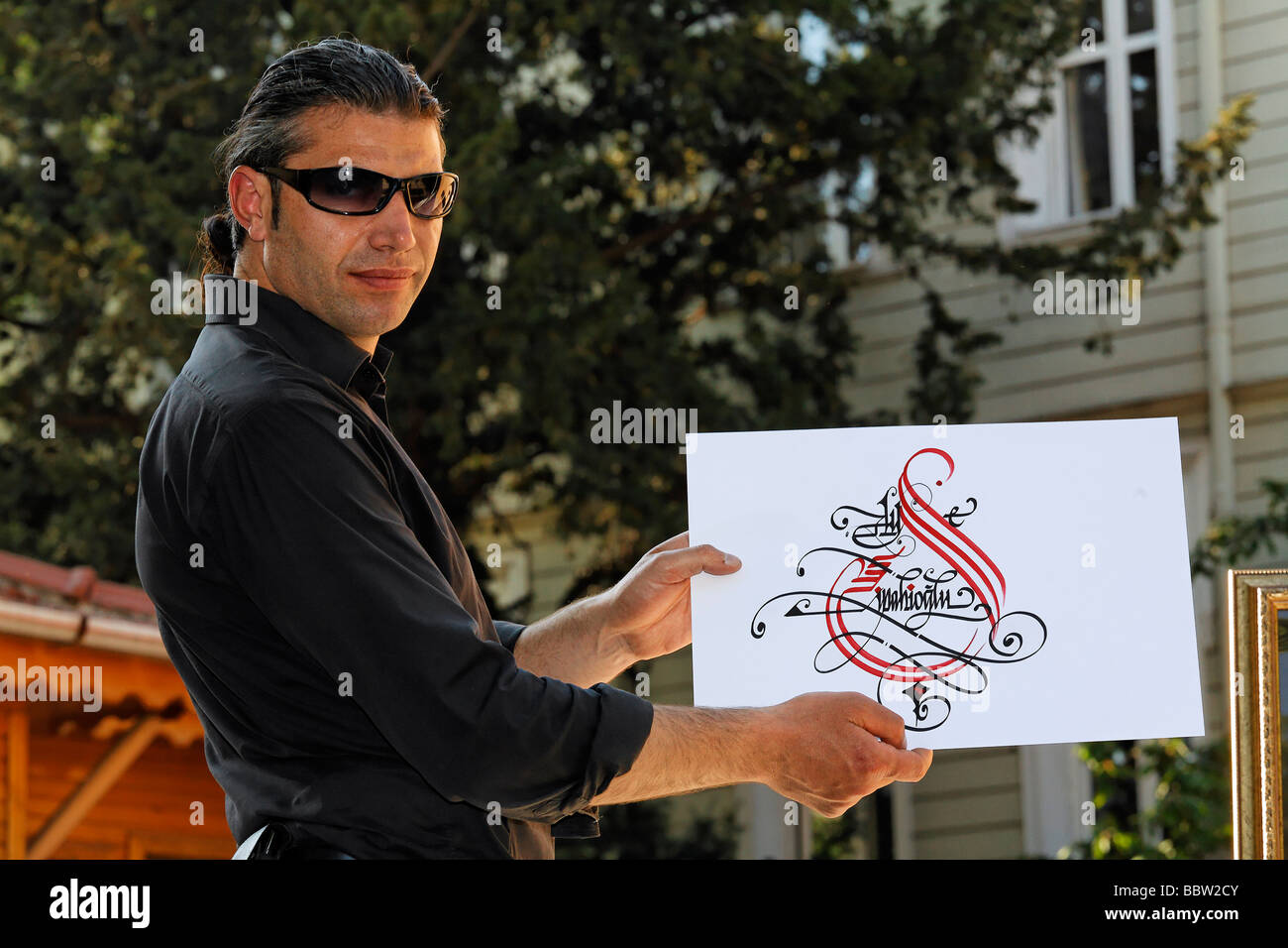 Turkish artist shows modern calligraphic drawing, Cafer Aga yard ...