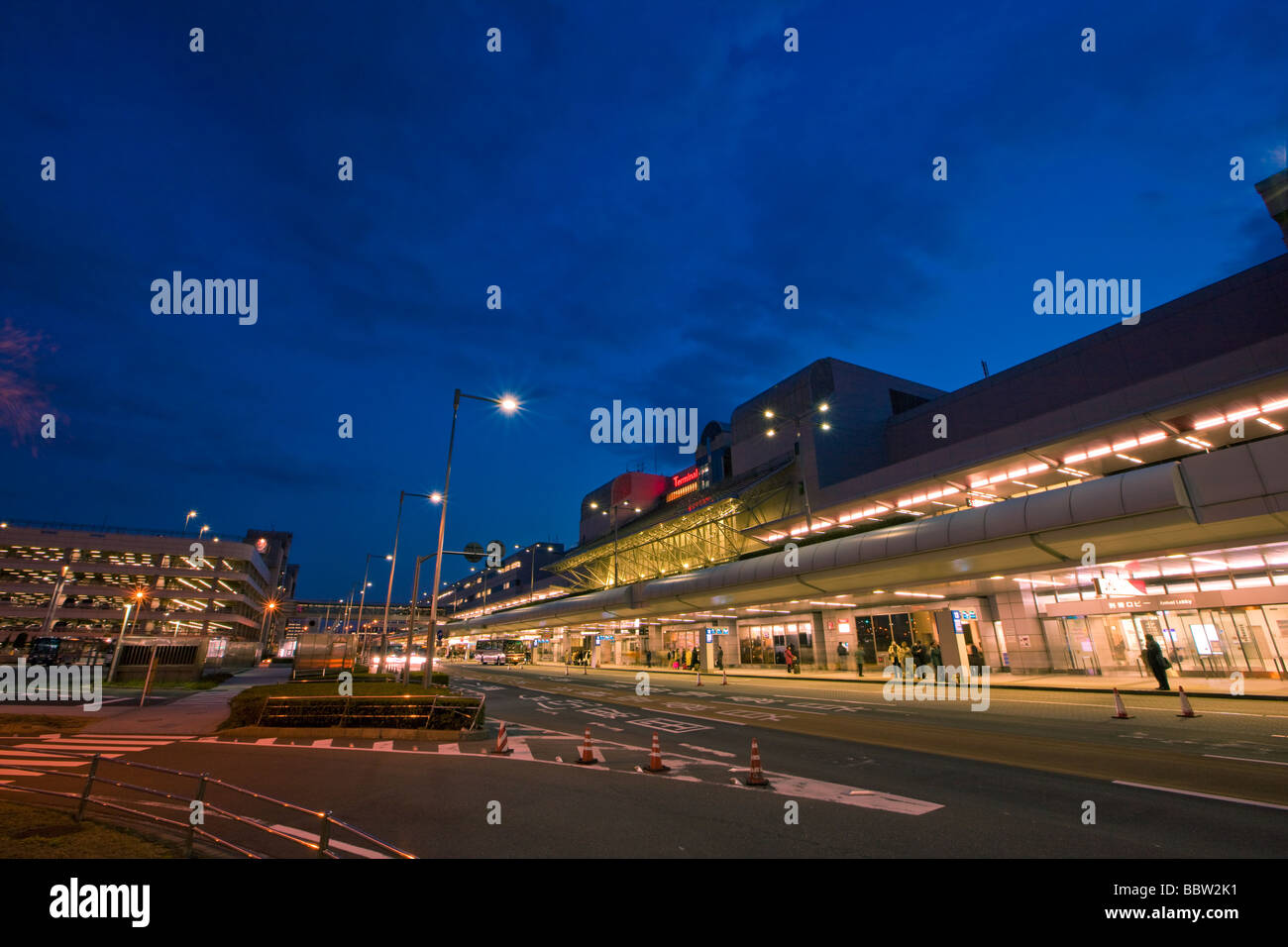 Roads with illuminated lights at airport terminal Stock Photo - Alamy