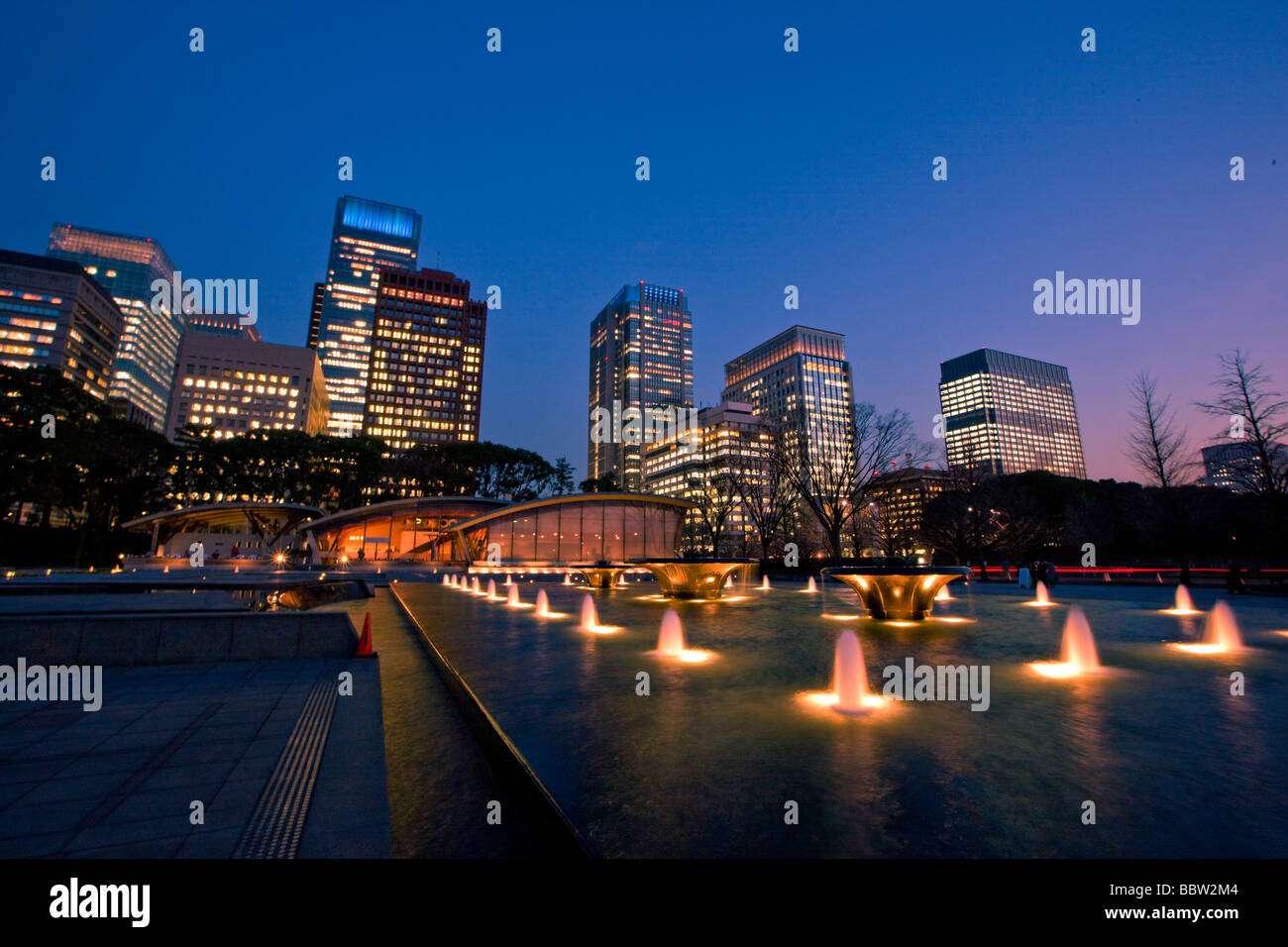 Illuminated buildings in downtown Stock Photo - Alamy