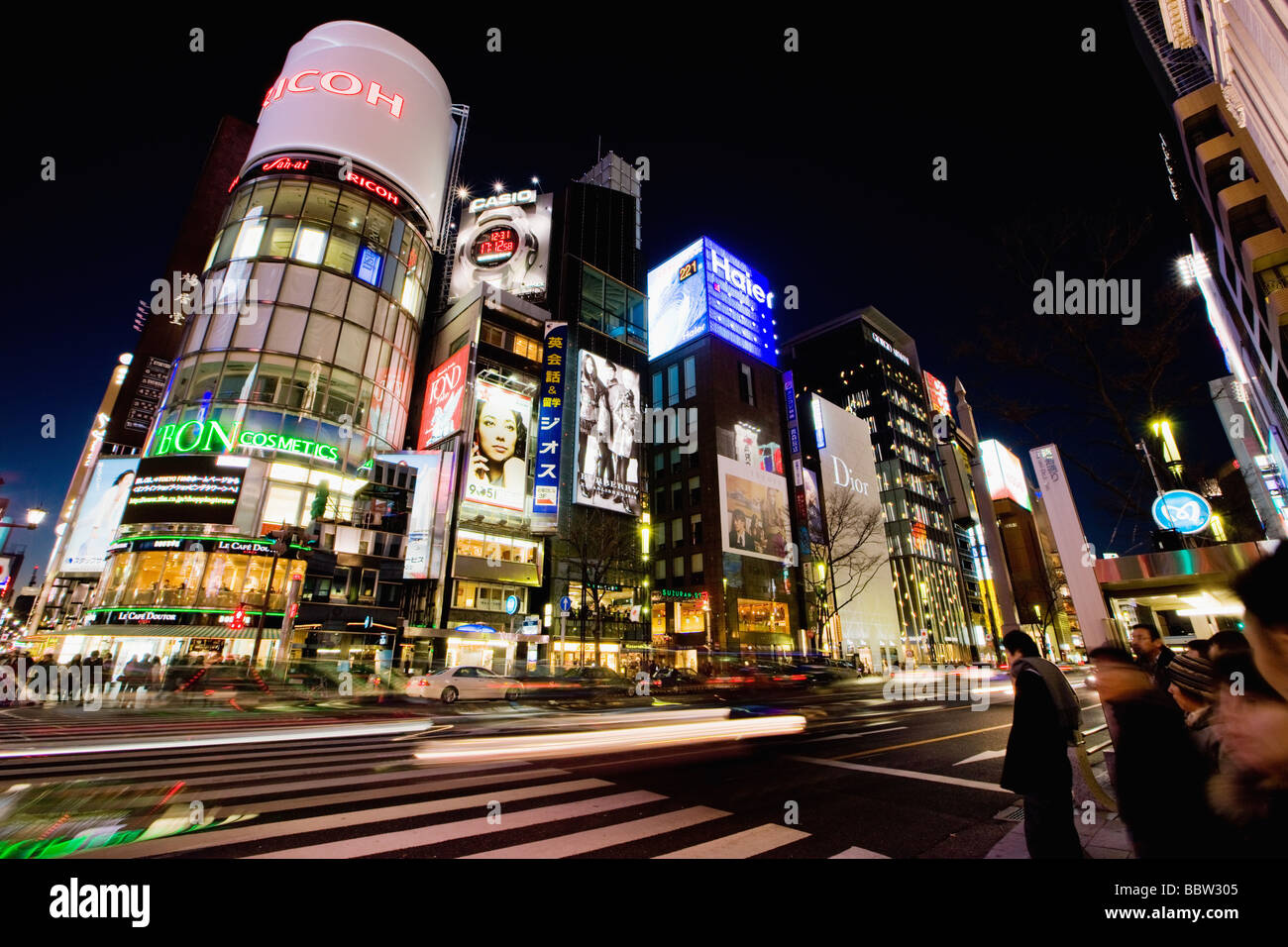 Street with shopping malls on roadside Stock Photo - Alamy