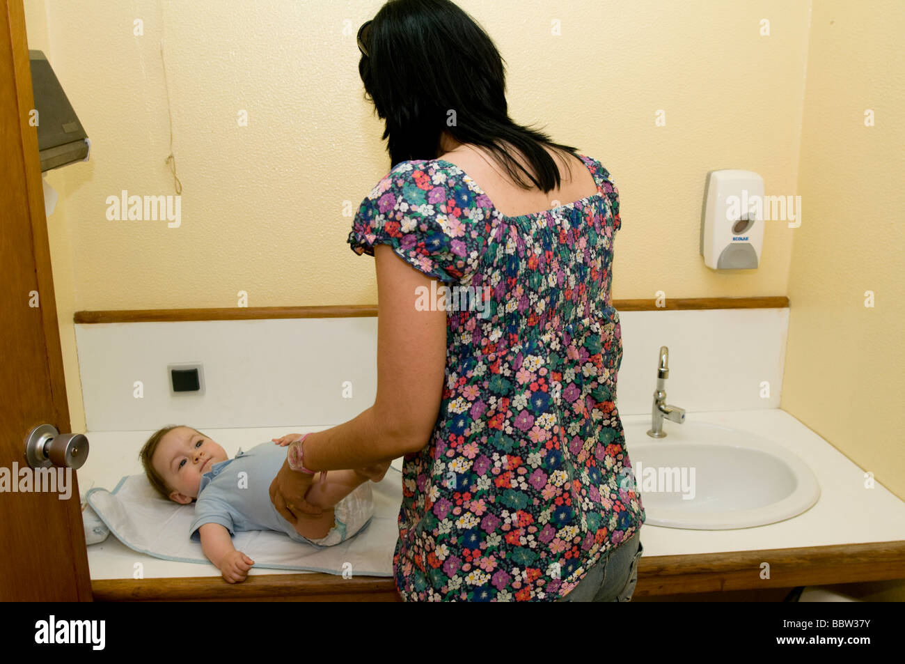 Changing nappies hi-res stock photography and images - Alamy