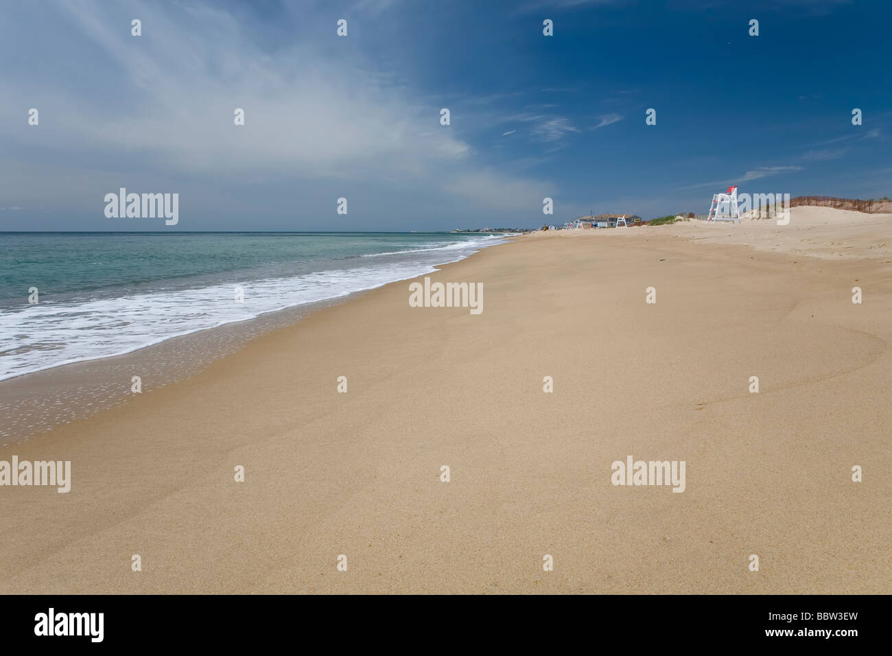 Beach photograph of a sandy path to the ocean Stock Photo - Alamy
