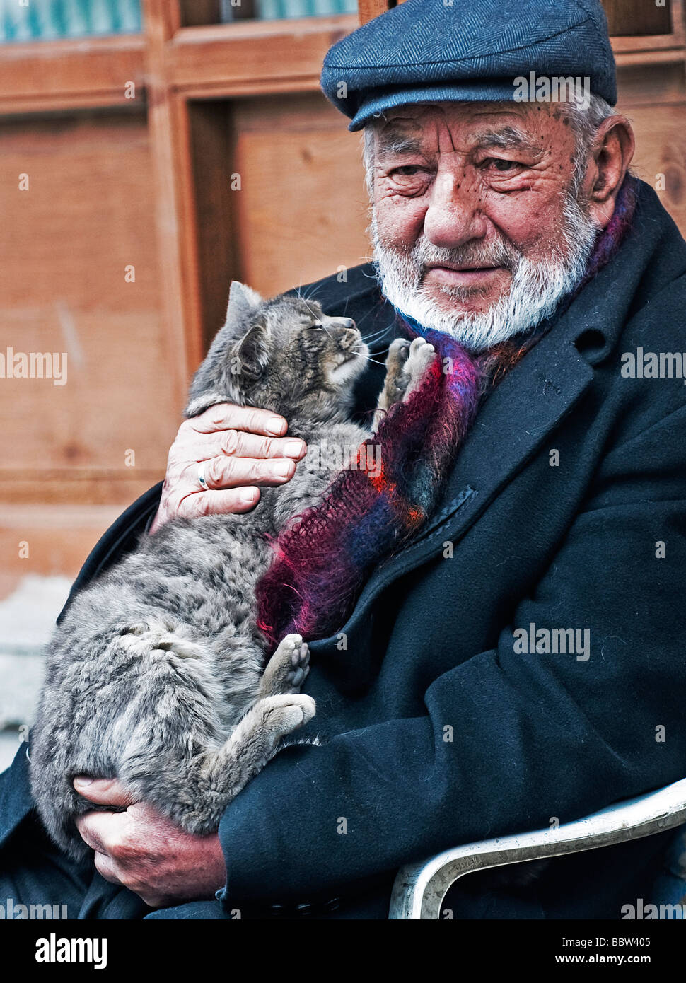 Ankara Turkey April 2008 old turkish man holding a cat Stock Photo - Alamy