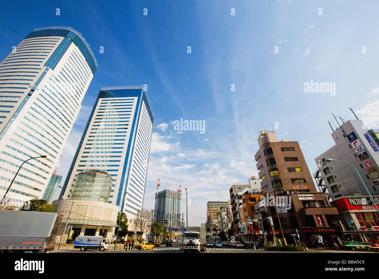 Road with buildings in downtown Stock Photo - Alamy