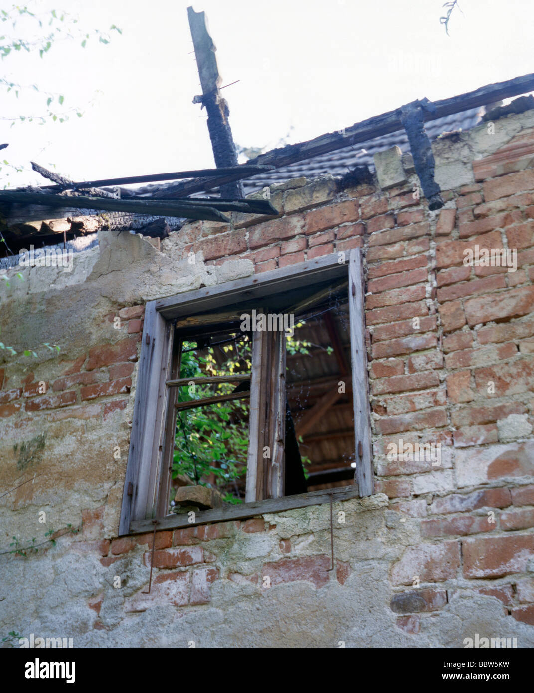 Abandoned window on ruined house Stock Photo - Alamy