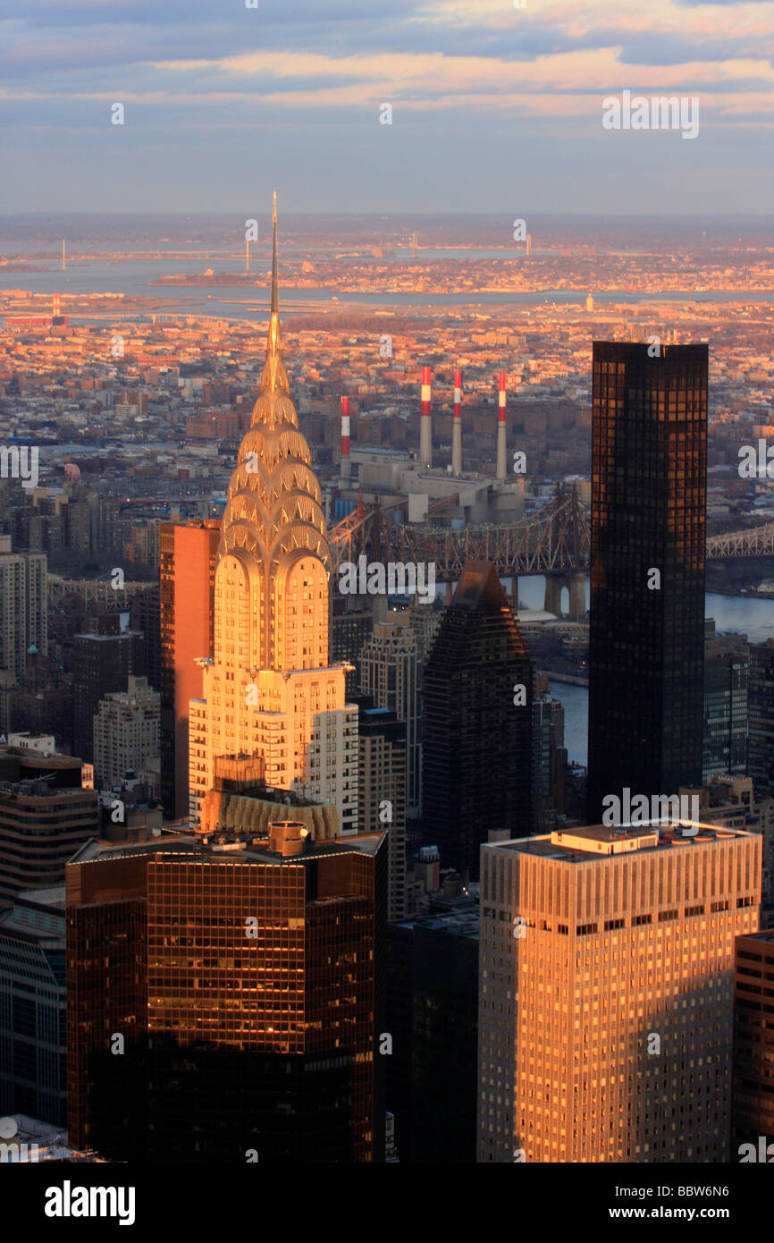 A night time view of building tops in New York City, from midtown area ...