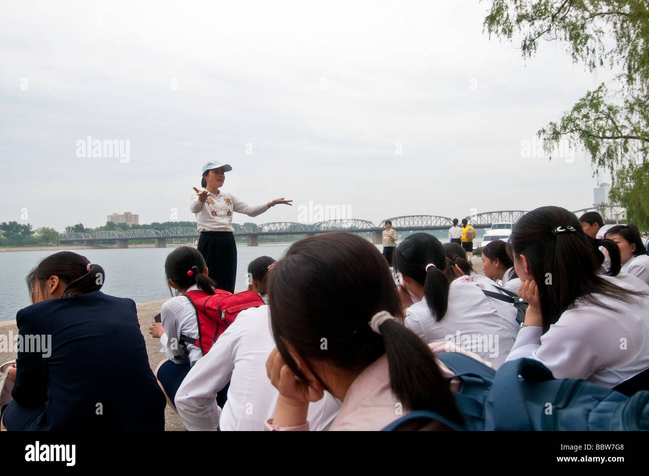 Students in Pyongyang singing songs to their classmates One would stand ...