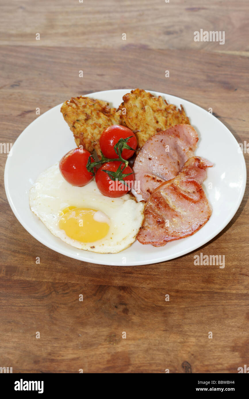 Traditional British Full English Cooked Breakfast With A Fried Egg ...
