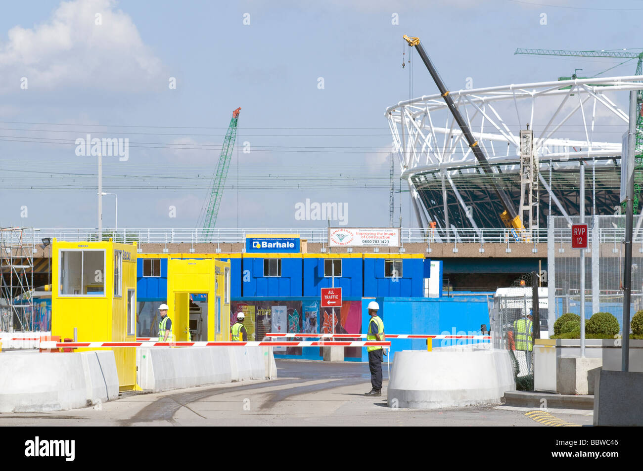 UK. SECURITY GUARDS AT SITE OF FUTURE OLYMPIC STADIUM. LONDON,ENGLAND ...