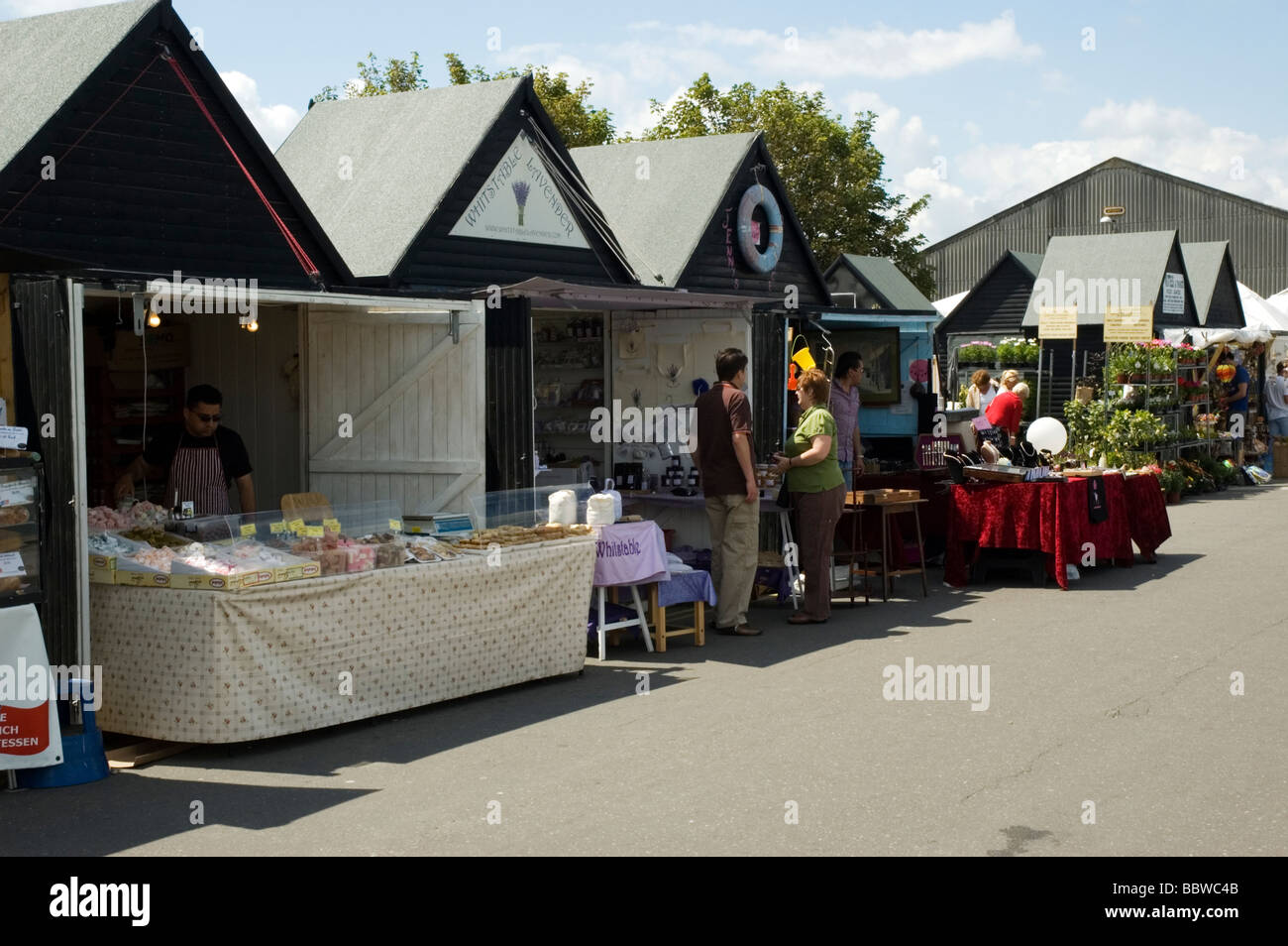 Market stalls on South Quay at Whitstable harbour, Kent, England Stock ...