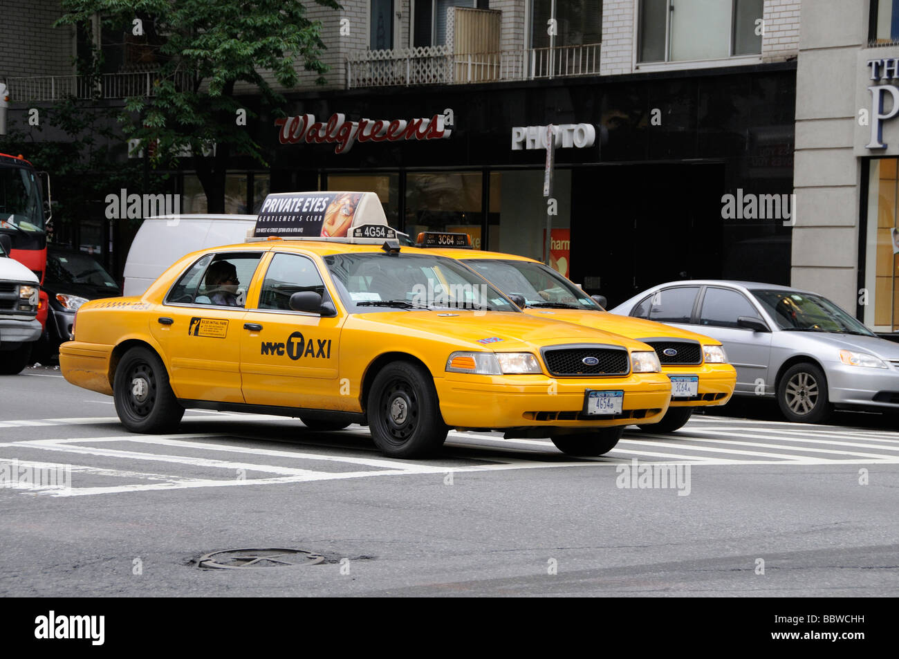 American yellow cab in downtown Manhattan New York USA Stock Photo - Alamy