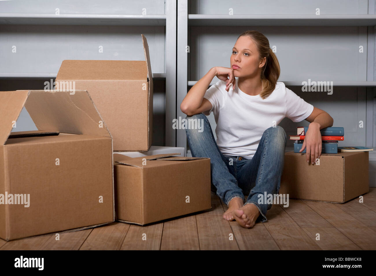 young woman and cartons, removal Stock Photo - Alamy