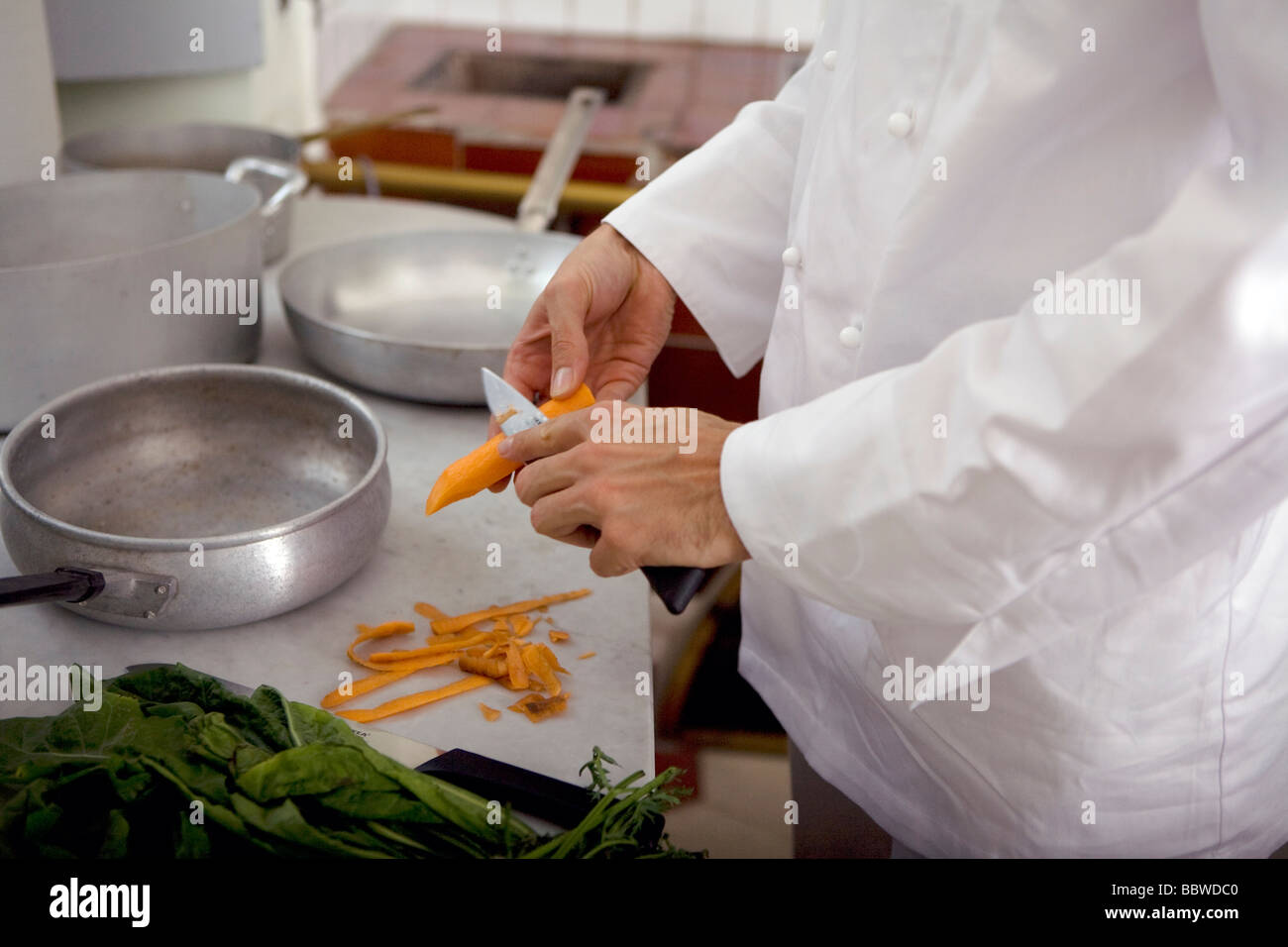 chef peeling carrot Stock Photo - Alamy