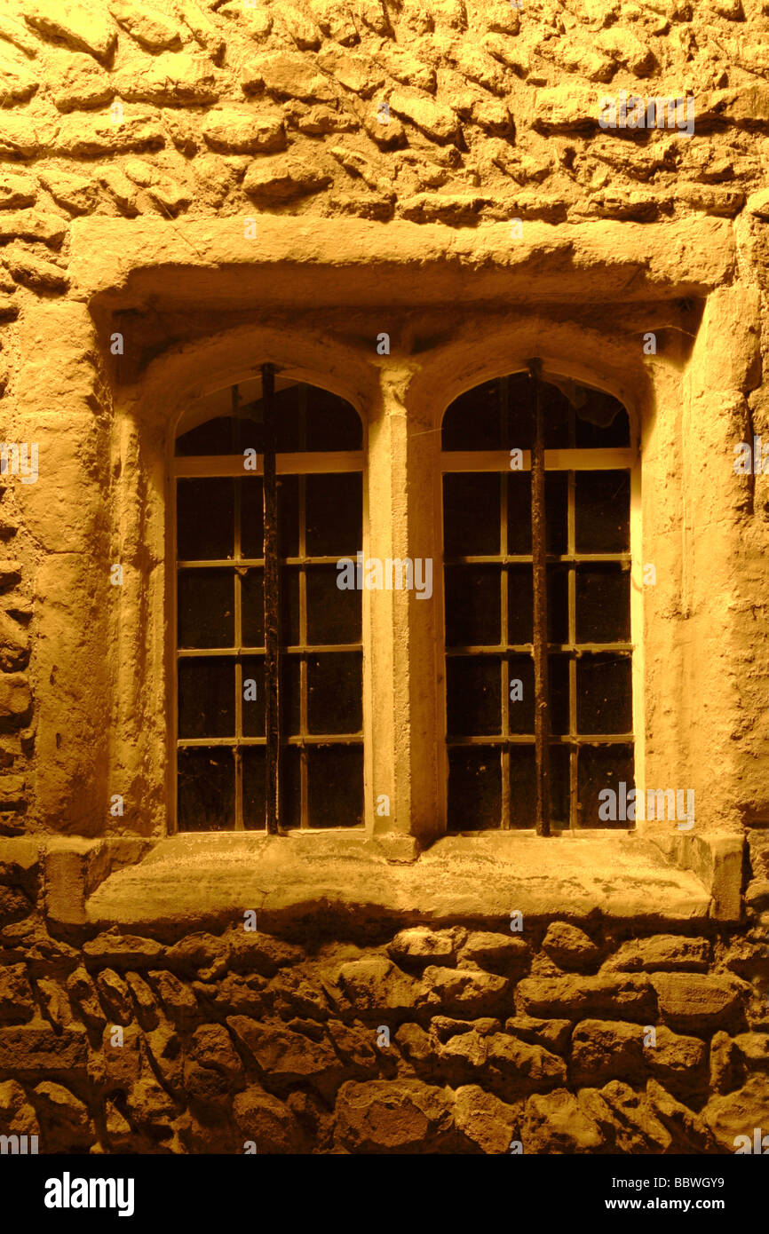 An old Cambridge college window at night Stock Photo - Alamy