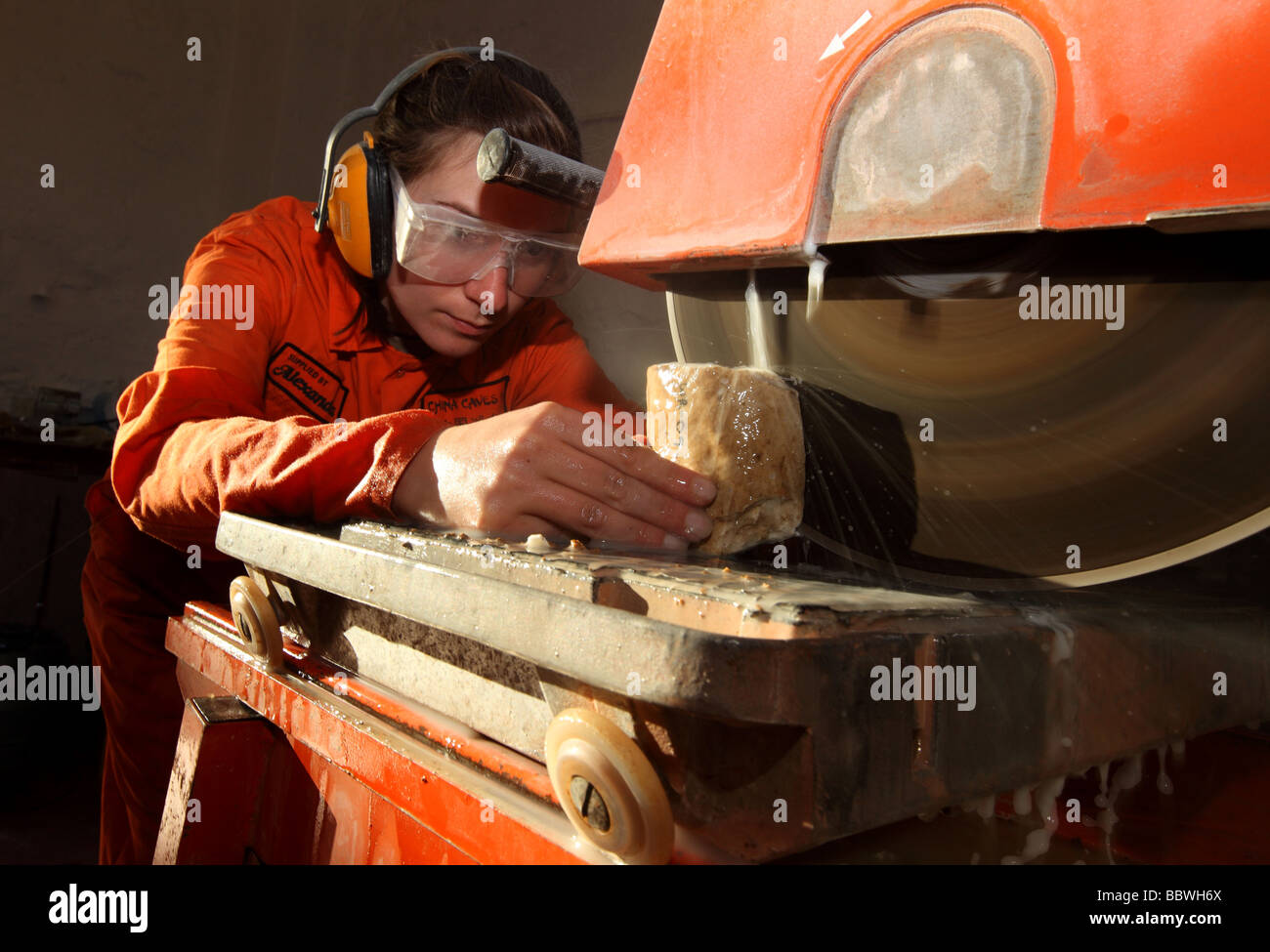 Scientist cutting up a Stalagmite sample from the giant caves of Borneo ...