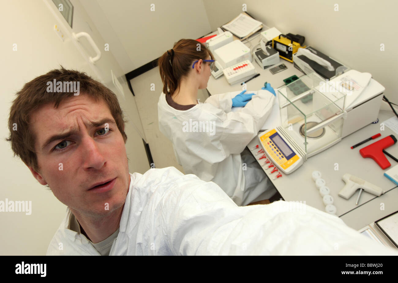 Photographer & Scientist in the Weighing Room of a Clean Room in a ...