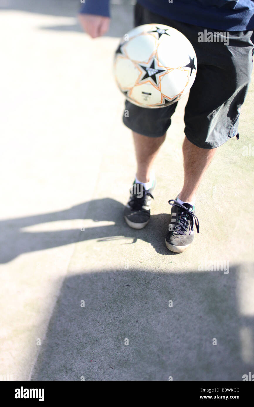 man with football Stock Photo - Alamy