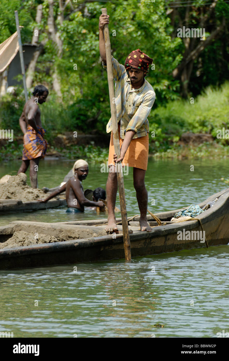 Indian man boatman rowing boat hi-res stock photography and images - Alamy