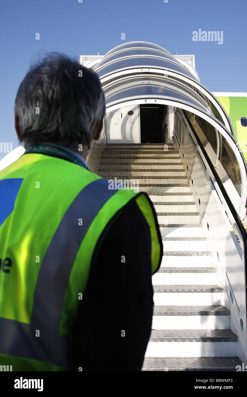 Airplane Ramp Staff preparing to receive passengers Stock Photo - Alamy