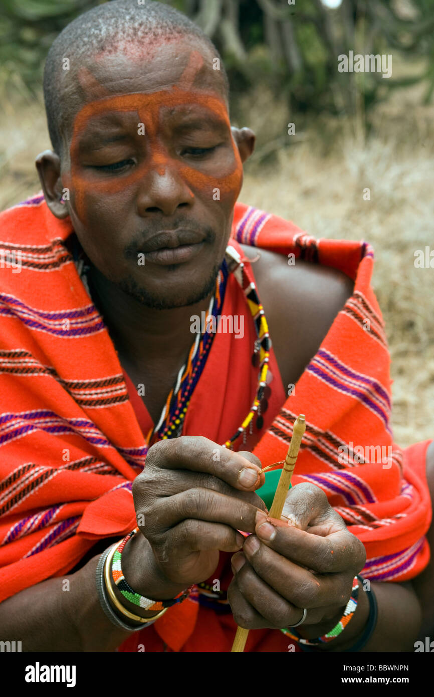 Maasai warrior making arrow - Maji Moto Maasai Village - near Narok ...