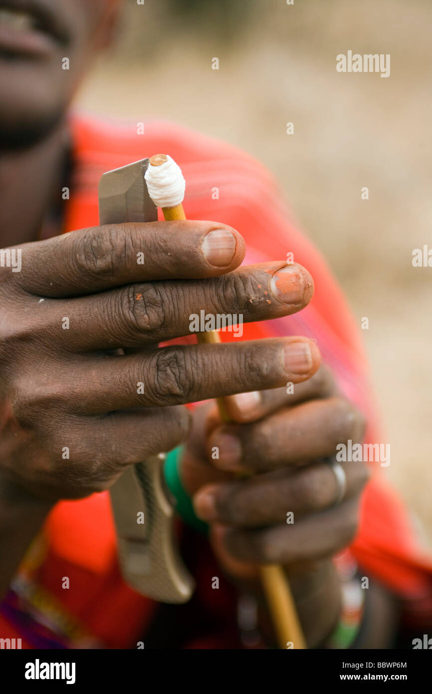 Maasai warrior making arrow - Maji Moto Maasai Village - near Narok ...
