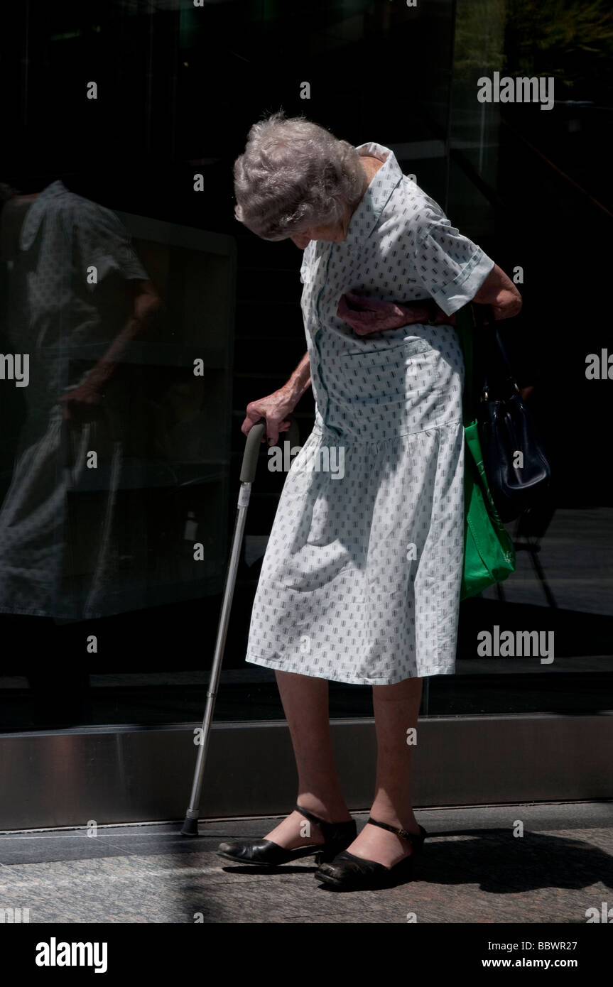 Old lady walking stick hi-res stock photography and images - Alamy