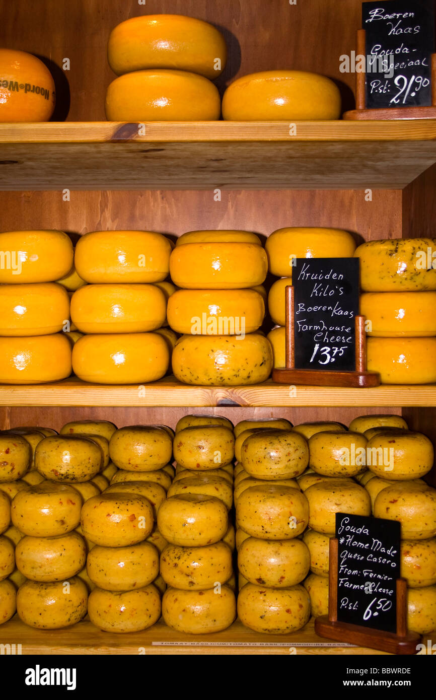 Dutch cheeses in yellow packaging stacked on shelves in an Amsterdam ...