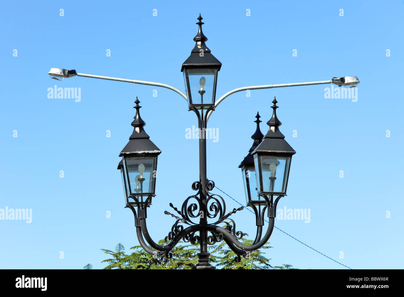 Ornamental street lights designed to look old in a city centre with ...