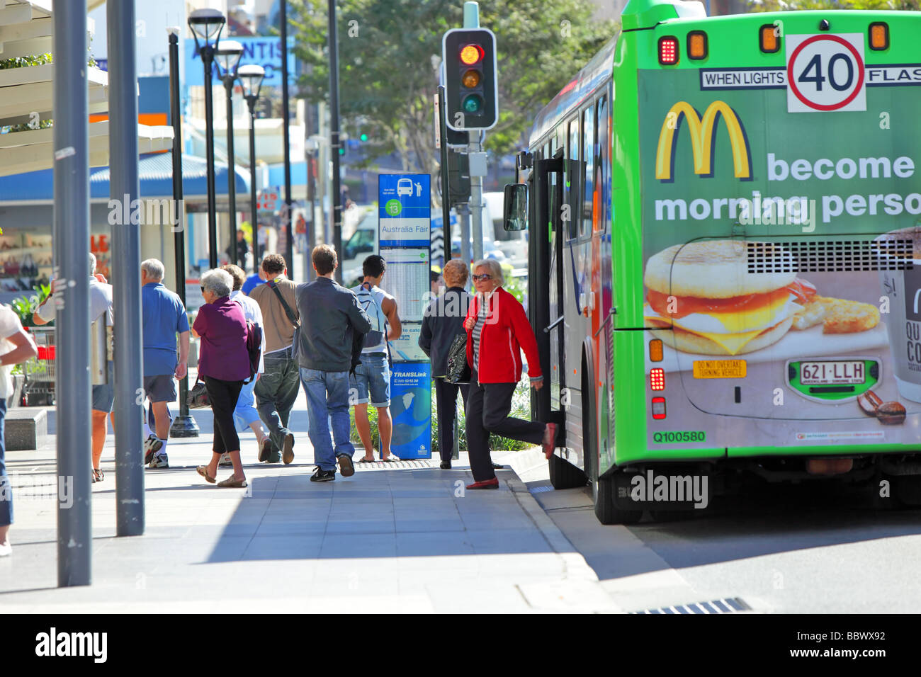 Woman getting on a bus hi-res stock photography and images - Alamy