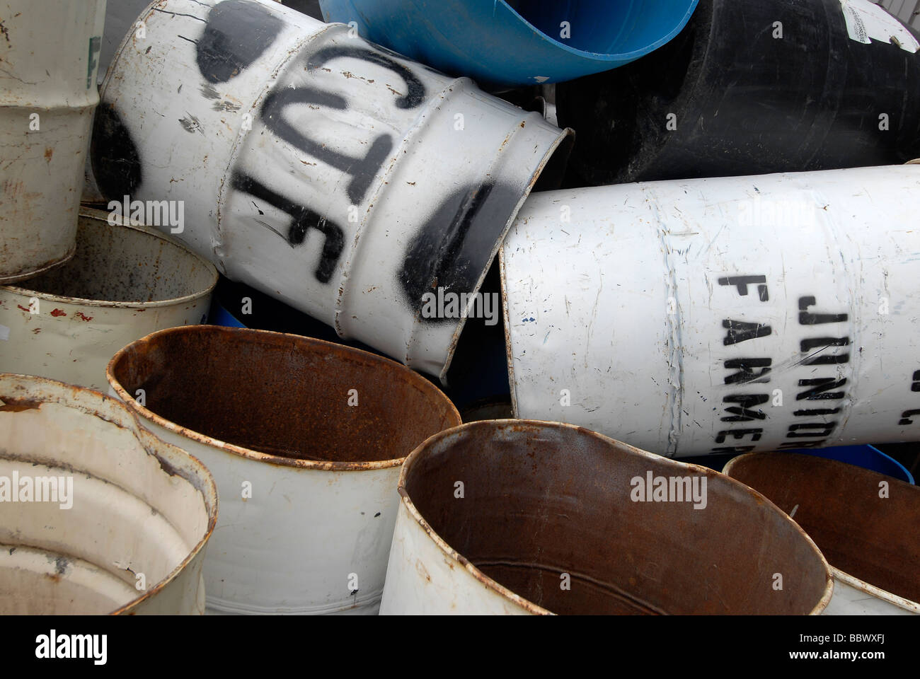 A pile of empty used oil drums Stock Photo - Alamy