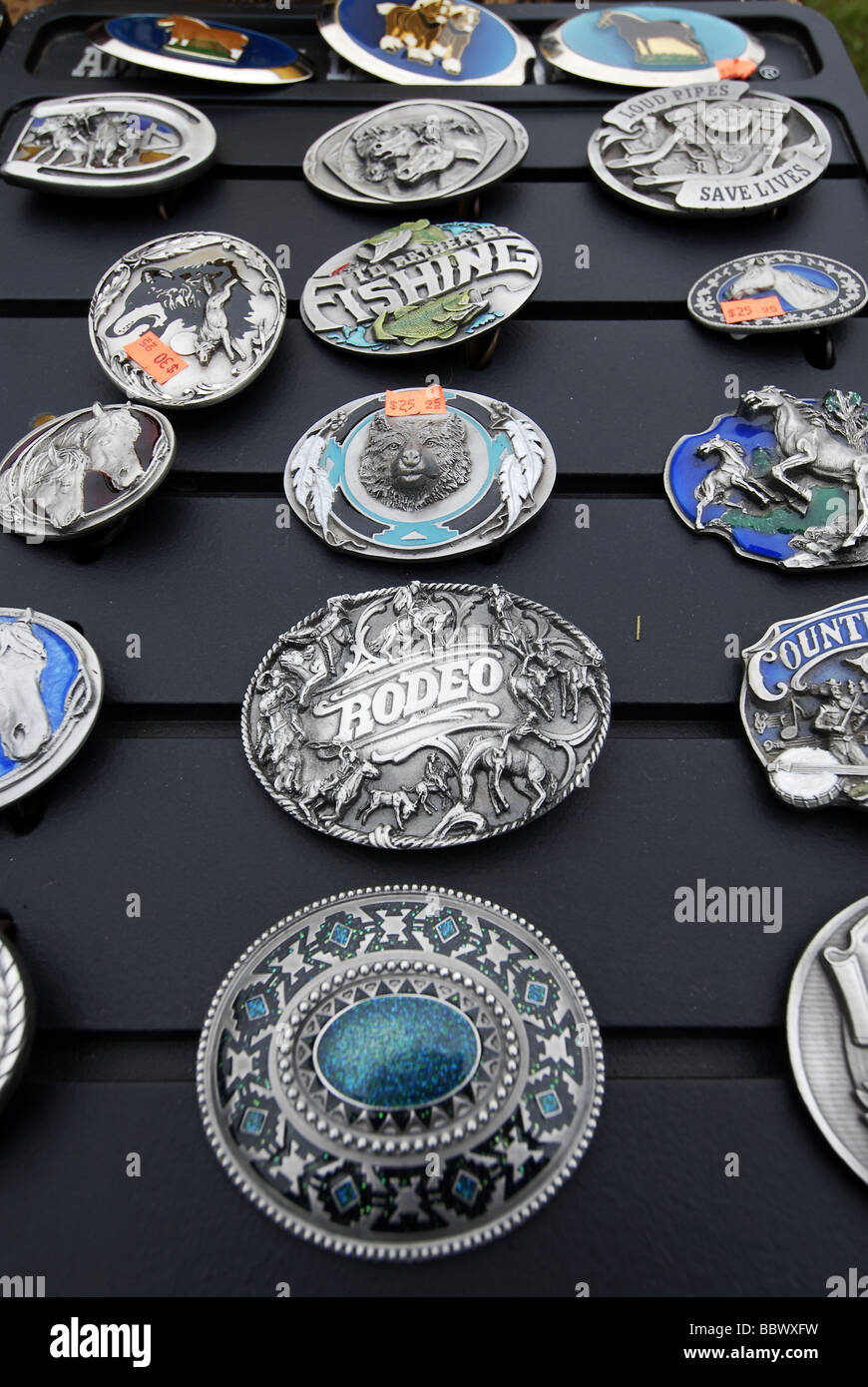 Rows of metal belt buckles Stock Photo - Alamy