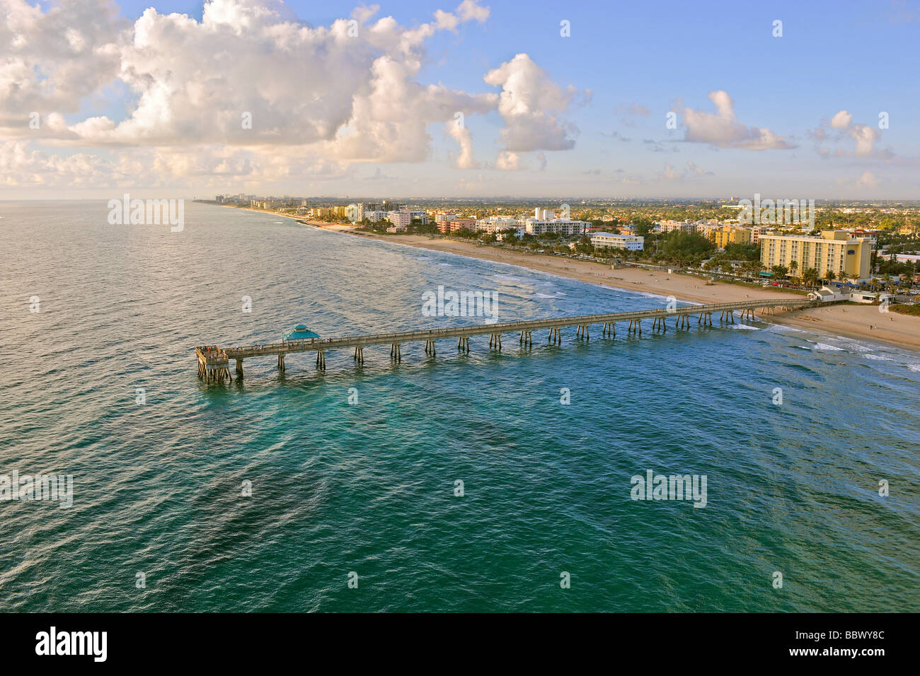 south florida fishing pier jutting into atlantic ocean and beach aerial ...