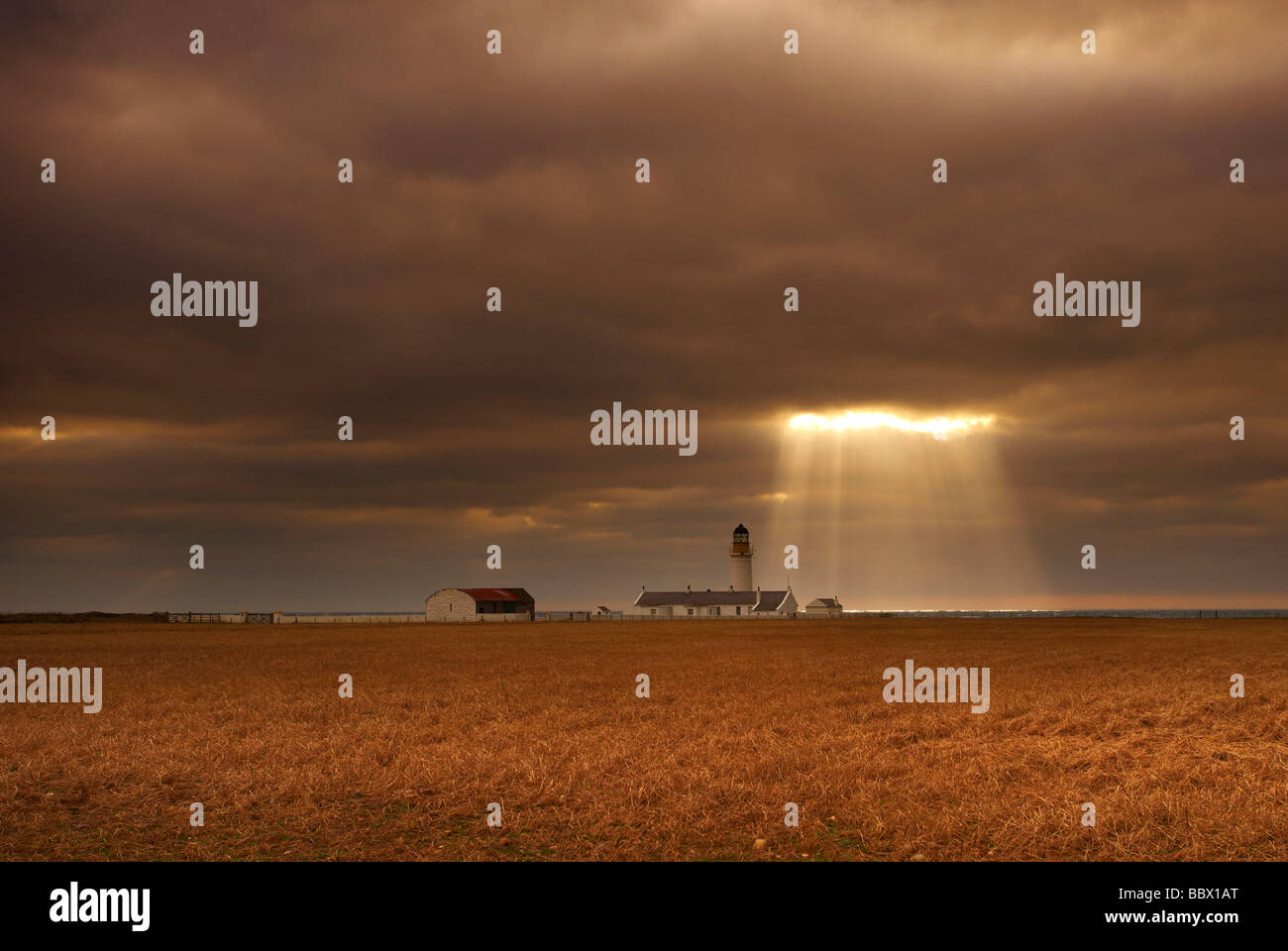 Dramatic Sunburst at the Lighthouse At Langness Isle Of Man Stock Photo ...