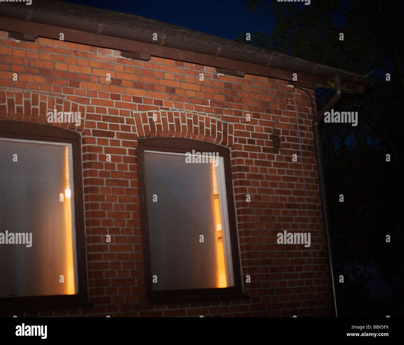 A red brick house by night Sweden Stock Photo - Alamy