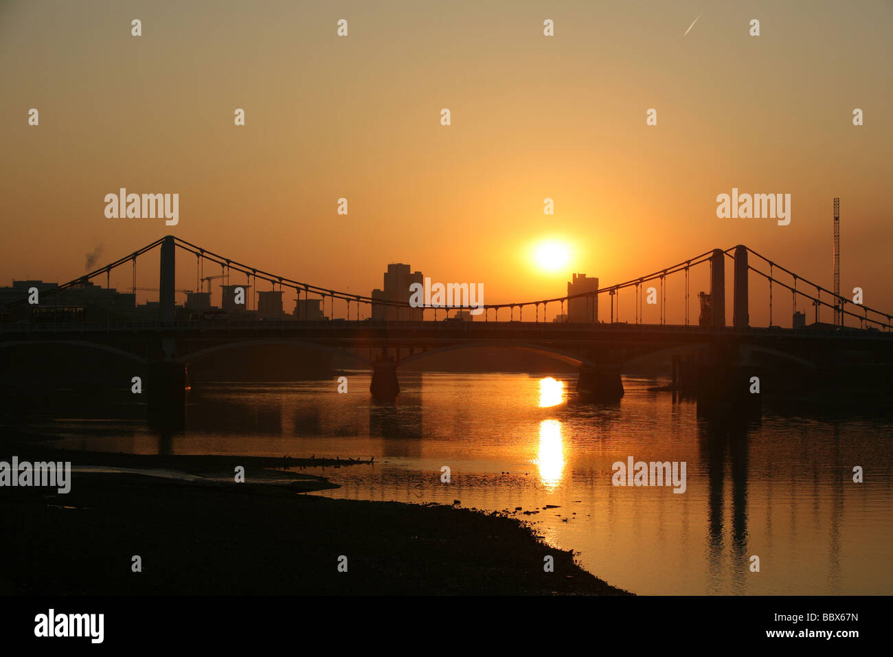 Chelsea Bridge at dawn viewed from Chelsea Embankment London Stock ...