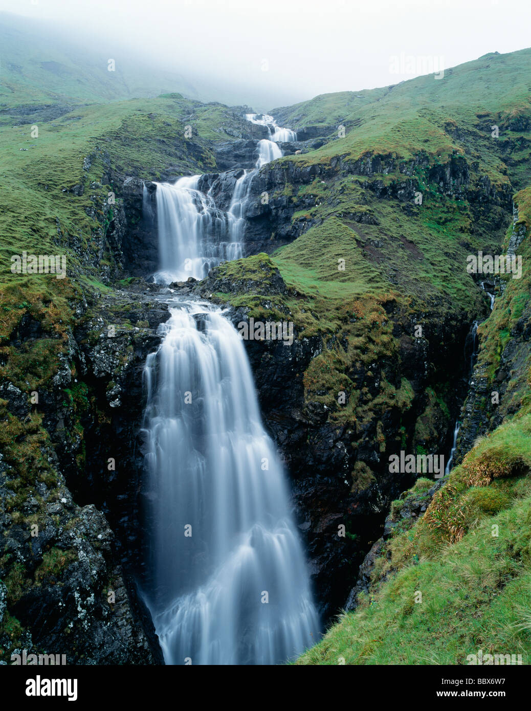 Mountain with waterfall Stock Photo - Alamy