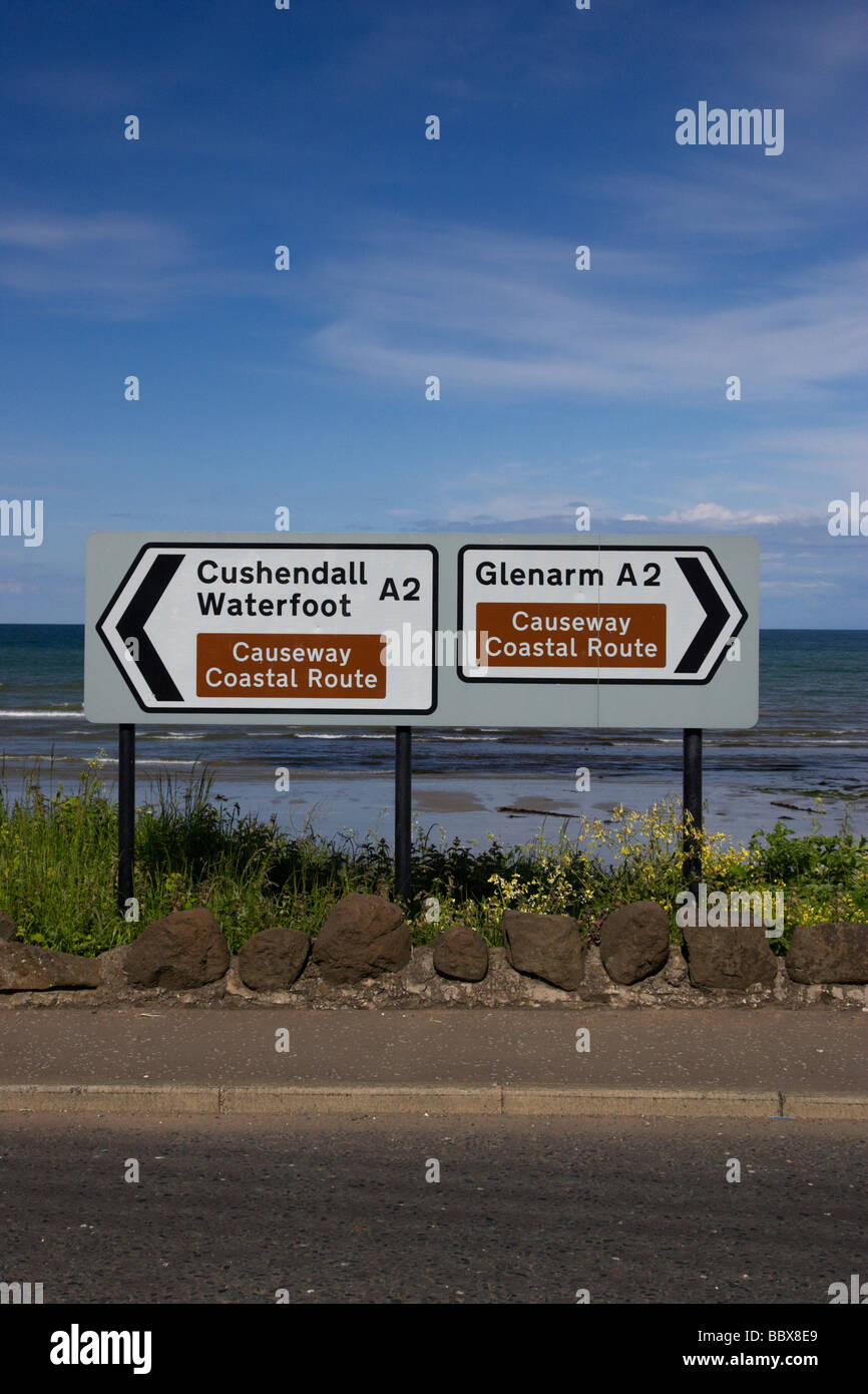 signposts for the causeway coastal route at carnlough between ...